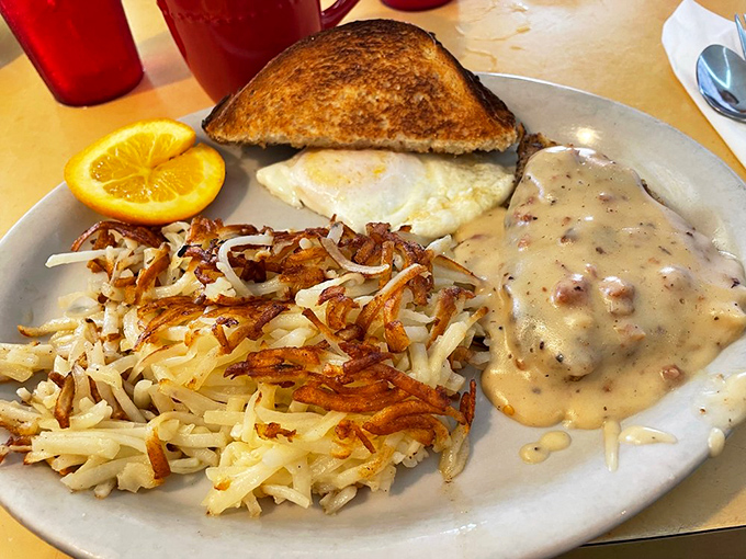 Crispy, savory, smothered in gravy &ndash; this chicken fried steak with hash browns is the breakfast equivalent of a warm hug from your favorite aunt.