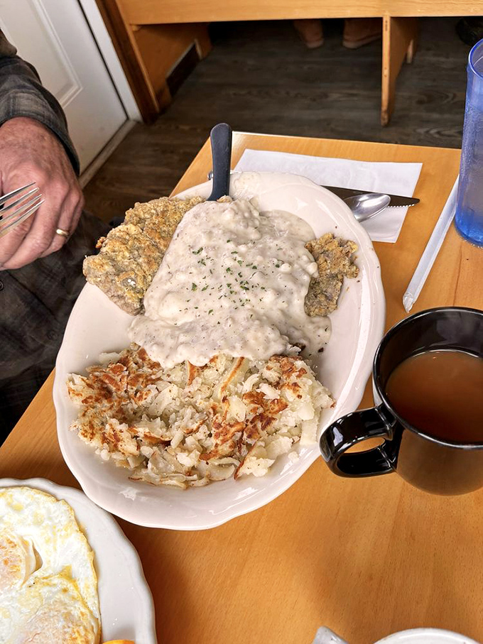 Chicken fried steak smothered in country gravy with crispy hashbrowns might not be what cardiologists recommend, but it's definitely what your soul ordered.