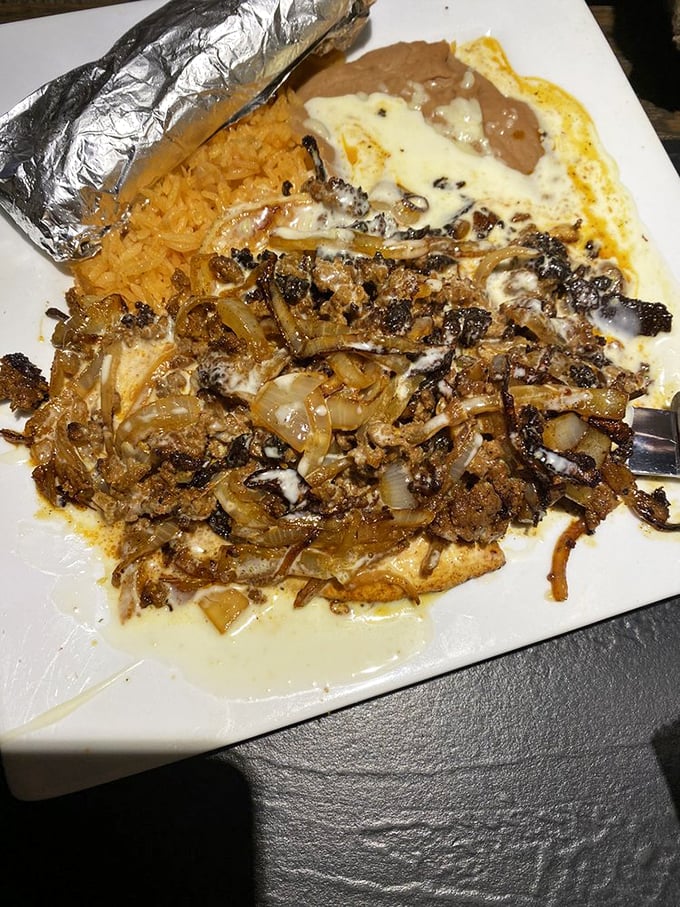 This dish doesn't just sit on the plate&mdash;it performs, with caramelized onions and seasoned meat creating a symphony that would make Mozart jealous.