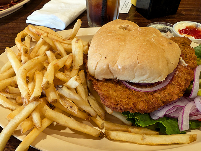 This chicken sandwich isn't messing around. Golden-fried, perfectly stacked, and large enough to make you consider unhinging your jaw like a python. Photo credit: <a href="" target="_blank" rel="noopener noreferrer">Dawn Blankenship</a>