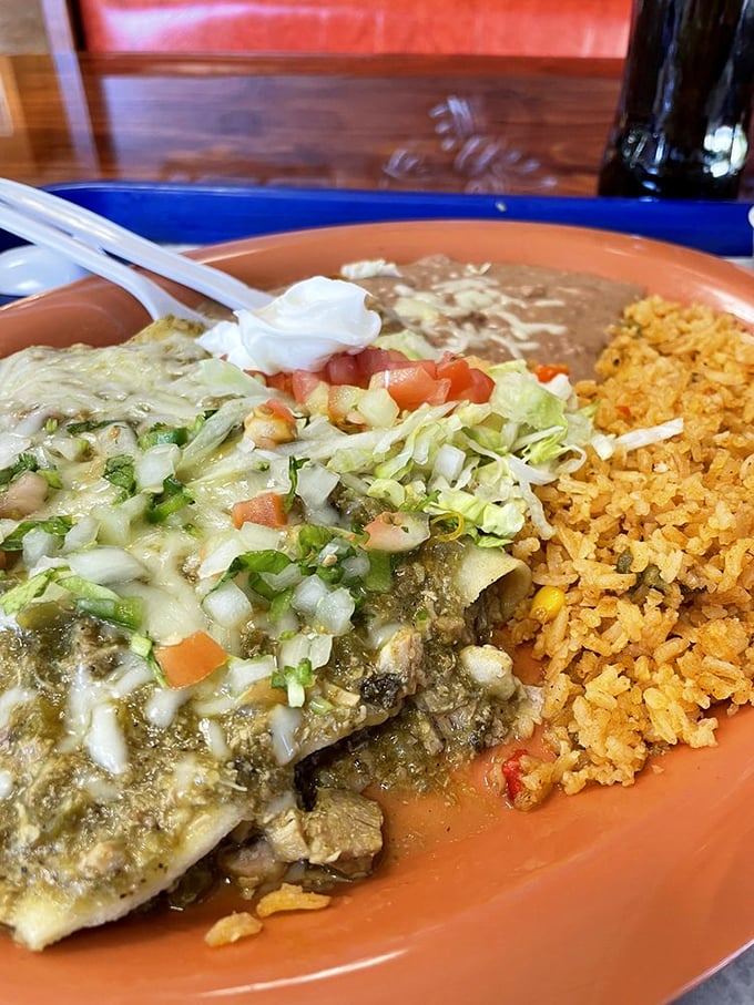 When melted cheese meets green chili sauce, magic happens. This plate doesn't just satisfy hunger—it creates happiness.