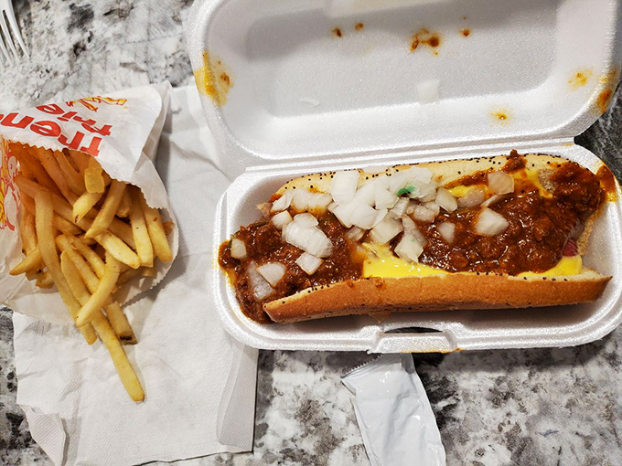 The perfect partnership: a chili-drenched masterpiece alongside golden fries. Like Batman and Robin, if they were delicious and didn't fight crime.