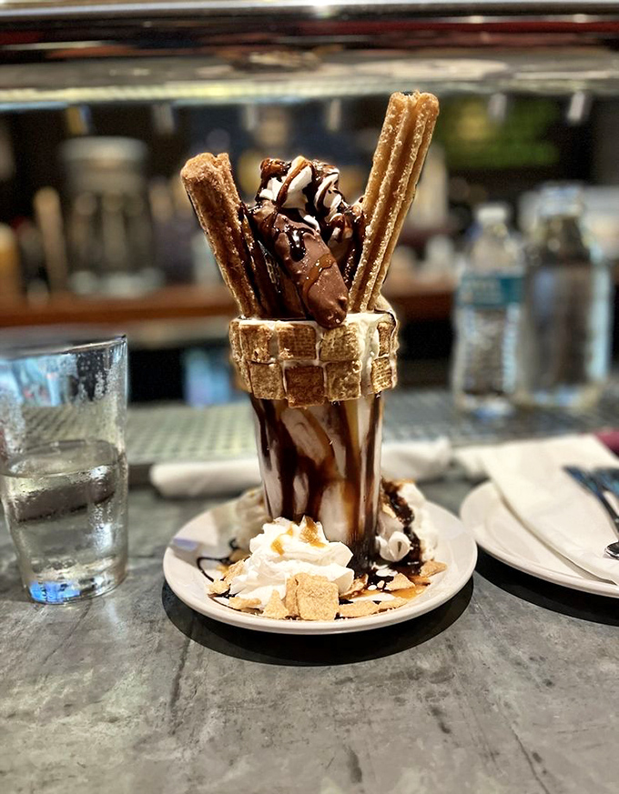 Not your grandmother's milkshake—this churro-topped creation bridges the gap between beverage and architectural achievement.