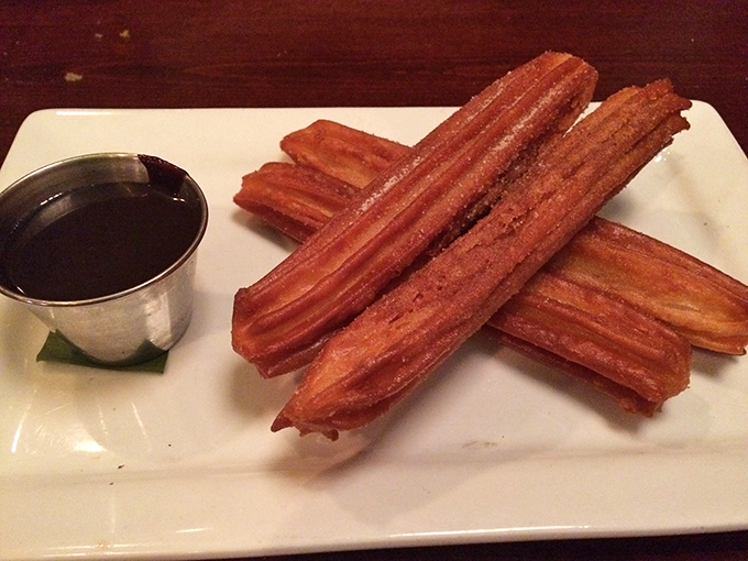 Churros that crackle with cinnamon-sugar glory—like crispy, ridged magic wands that transform ordinary days into celebrations with one bite.