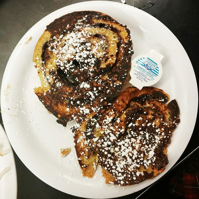French toast that looks like it's been dusted by a confectioner fairy godmother&mdash;breakfast dessert that makes no apologies for its decadence.
