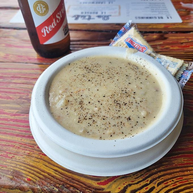 Clam chowder that could make a New Englander question their loyalty. Creamy, peppery comfort in a bowl with crackers standing by.