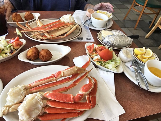 Snow crab legs sprawled across the table like oceanic royalty, demanding your time, attention, and every bit of drawn butter.