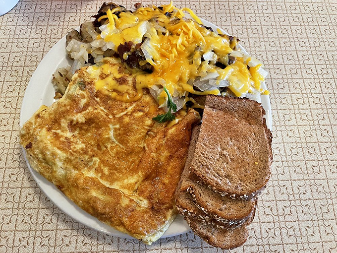 The Denver omelet and those cheese-covered potatoes speak the universal language of "you'll need a nap after this," and I'm completely fluent.