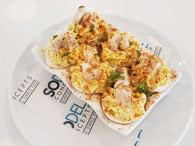 Deviled eggs gone coastal! These aren't your grandmother's picnic staples&mdash;unless grandma was secretly a genius with seafood garnishes and spice.