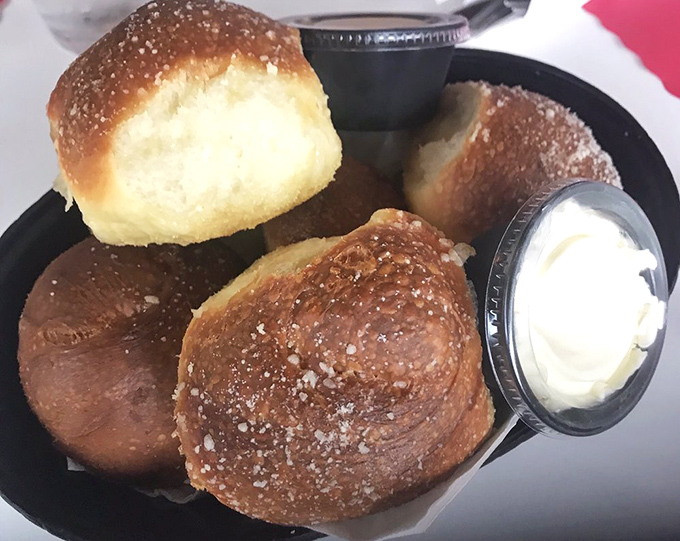 These golden-brown dinner rolls aren't just bread &ndash; they're warm, pillowy vehicles for the butter that melts into their souls.