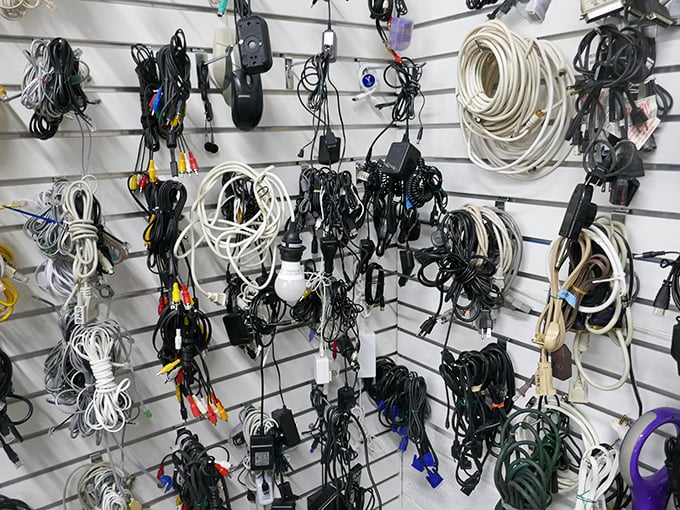 The electronics wall &ndash; where yesterday's cables, adapters and cords find new purpose. Tech archaeologists, this is your happy hunting ground.