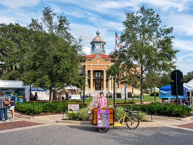 The historic Citrus County Courthouse stands proud amid a bustling market day. Even government buildings have personality in this charming Florida town.