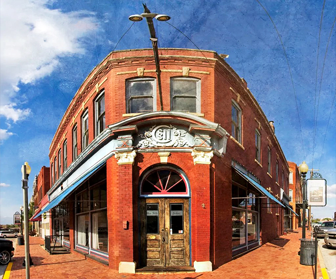 This corner building with its ornate "G" emblem isn't just surviving—it's showing off, like your grandpa who still does pushups at 90.