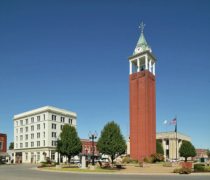 The clock tower and historic buildings frame Tower Square Plaza, where "meeting at the tower" has been Marion's social GPS for generations.