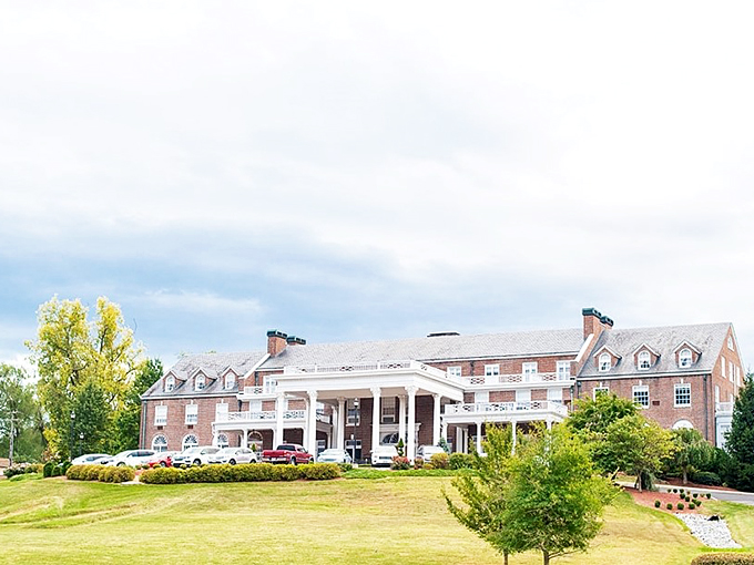 The Mimslyn Inn stands as a testament to Southern hospitality, its colonial revival architecture practically whispering "come sit a spell."