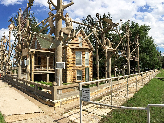 The Garden of Eden in full sunlight showcases Dinsmoor's concrete "forest" surrounding his limestone cabin. Retirement projects have certainly evolved since 1907.