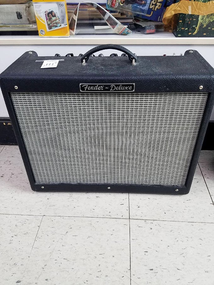 A Fender Deluxe amp sits quietly, holding decades of musical history and just waiting for someone who appreciates its potential more than its price tag.
