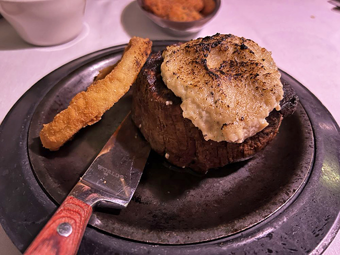 If Michelangelo sculpted steak instead of marble, it would look like this filet mignon &ndash; topped with what appears to be blue cheese butter melting into beefy paradise.
