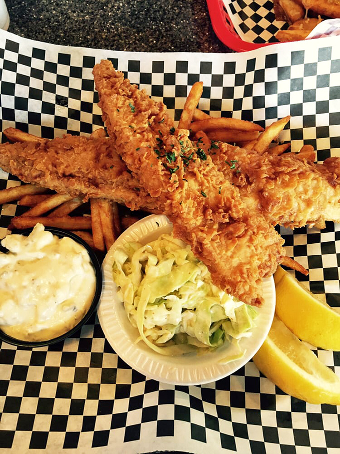 Golden-battered fish and crispy fries served with the kind of coleslaw that makes you wonder why you don't eat more coleslaw. Pure comfort.