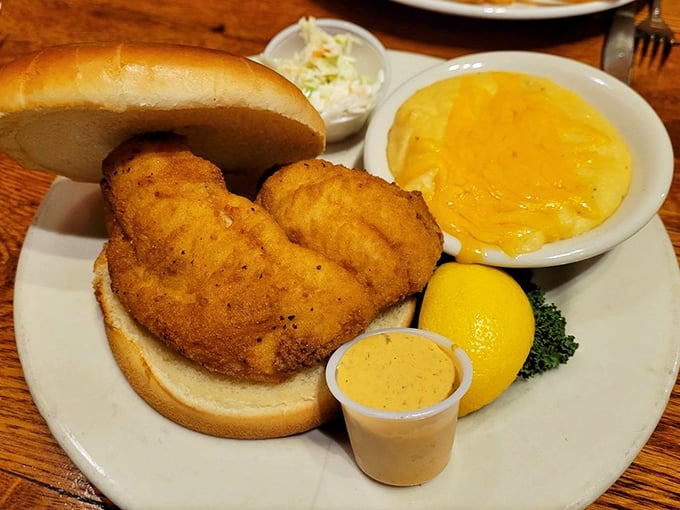 Seafood done right &ndash; crispy fried fish on a soft bun with all the fixings. Simple pleasures are often the most satisfying.