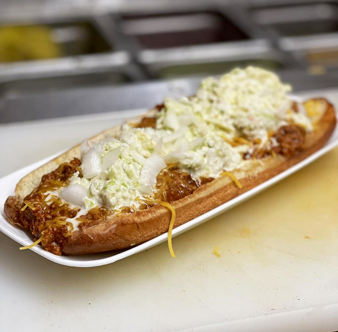 This isn't just a hot dog—it's a flavor freight train stretching the length of its bun. The coleslaw adds a cooling counterpoint to the chili's swagger.