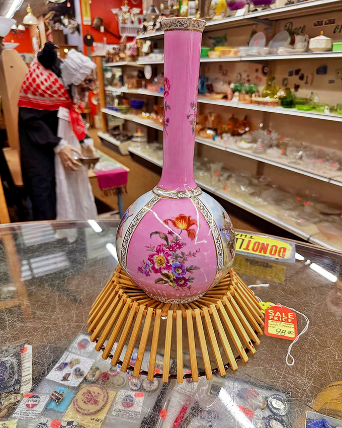 This pink porcelain vase isn't just decorative&mdash;it's the starring character in someone's "look what I found for $20!" story waiting to happen.