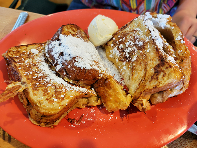 French toast that looks like it graduated from culinary school with honors&mdash;golden-brown, dusted with powdered sugar, and ready for its close-up.