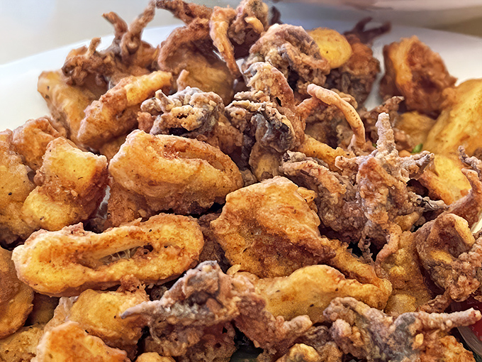 Fried calamari that actually tastes like calamari, not just fried batter. Crispy exterior, tender interior&mdash;the Goldilocks of seafood appetizers.