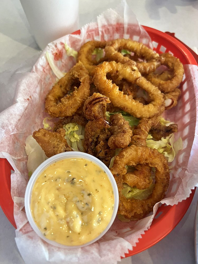 These crispy calamari rings deserve their own Olympic event. The creamy dipping sauce gets the silver medal&mdash;it knows its place.