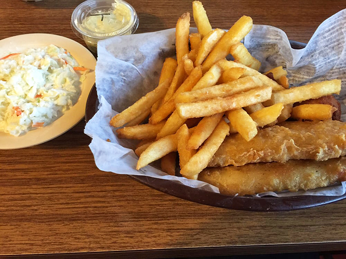 Fish and chips that would make the British nod in approval, with coleslaw providing that perfect creamy counterpoint to the crispy batter.