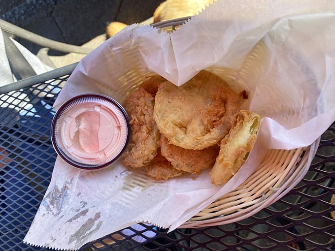 Fried green tomatoes with a cornmeal crust that shatters just right. Proof that unripe fruit can have a higher purpose in the South.