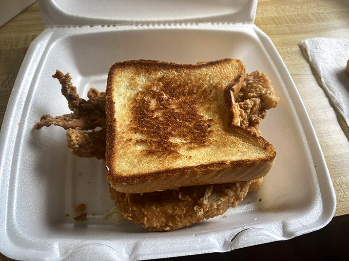 Golden-brown toast embracing perfectly fried pork&mdash;a sandwich so simple yet so sublime it makes you question all other lunch decisions.