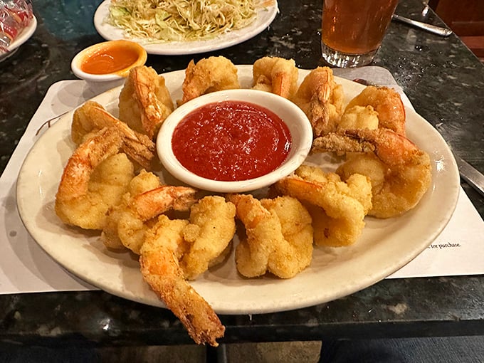 Golden-fried shrimp arranged like a delicious crown around that cocktail sauce throne. Seafood this good makes you question why you ever lived inland.
