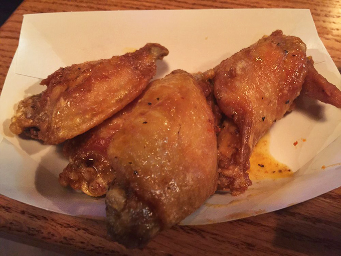 Golden-brown chicken wings glisten with promise, ready to deliver that finger-licking satisfaction we all crave on game day.