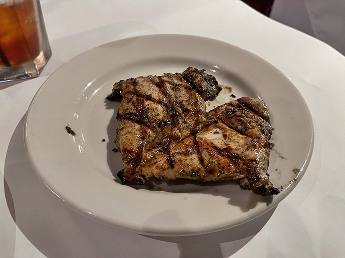 This perfectly grilled chicken breast laughs at diet food stereotypes&mdash;bathed in a cream sauce that would make Julia Child high-five a Southern chef.
