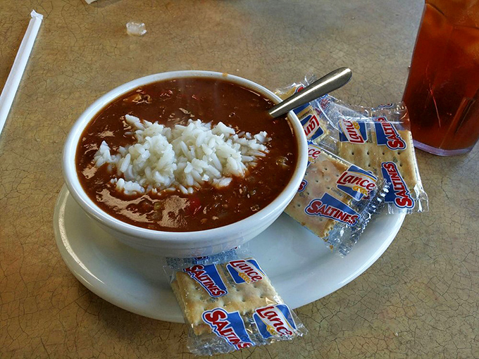 This isn't just gumbo, it's liquid comfort – a rich, dark roux filled with treasures that would make even Louisiana natives tip their hats in respect.