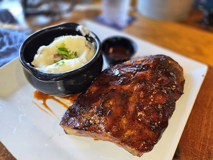 These ribs don't just fall off the bone&mdash;they practically leap into your mouth. Served with a side of mashed potatoes that would make any grandmother nod in approval.