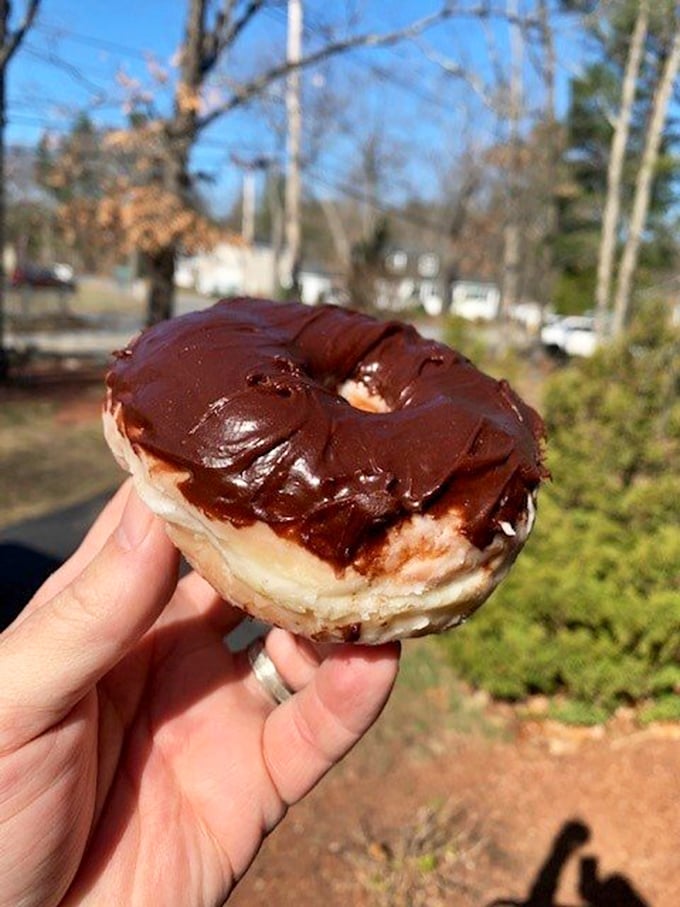 Chocolate frosted perfection against a New England backdrop. Even Mother Nature stops to admire these donuts&mdash;they're that photogenic.