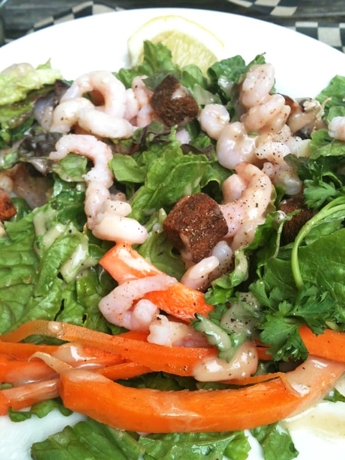 This isn't just a shrimp salad; it's summer on a plate where each bite delivers the kind of freshness that makes you momentarily forget about dessert.