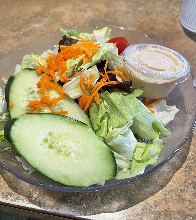 A side salad that actually deserves respect. Crisp vegetables and house dressing prove even the supporting actors get star treatment here.