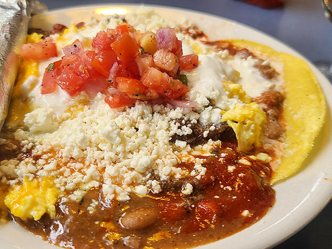 Not just breakfast, but a celebration: eggs, beans, cheese and salsa creating a festival of flavors that would make New Mexico proud.