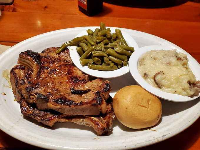 Jack Daniel's Pork Chops with all the fixings&mdash;proof that while steaks may headline, the supporting cast deserves standing ovations too.