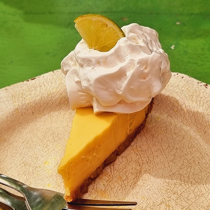 The Key Lime Pie here doesn't mess around &ndash; vibrant yellow filling, just the right balance of sweet and tart, topped with a cloud of whipped cream.