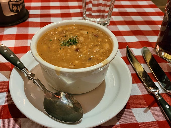 A hearty bowl of lentil soup that could convert even the most dedicated carnivore into believing vegetables occasionally deserve the spotlight too.
