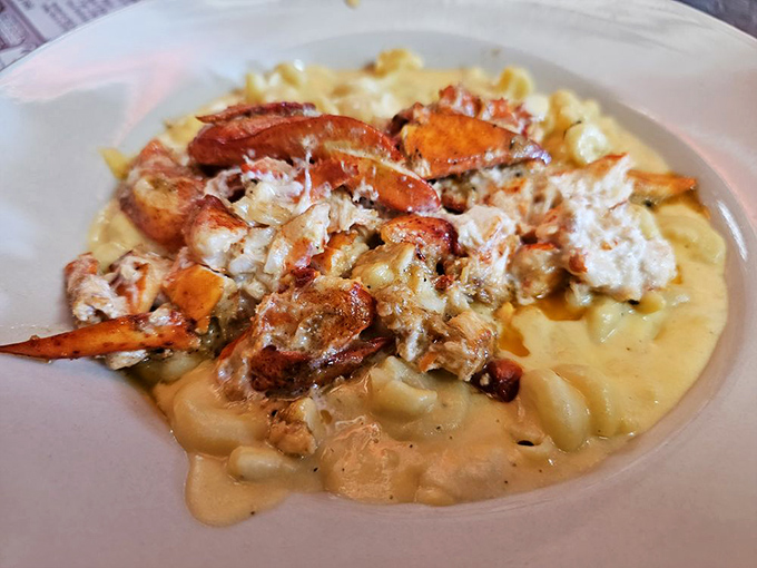 Lobster mac and cheese that makes you question why anyone would eat this dish without seafood. New England comfort food that hugs your soul.