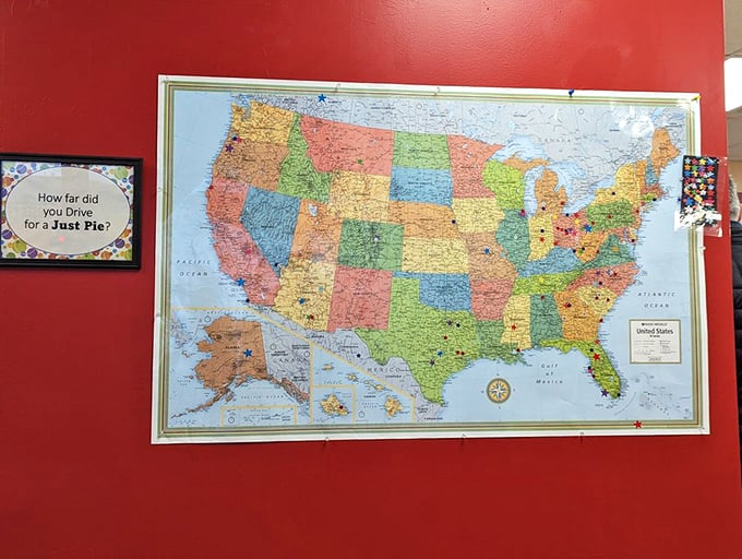 The wall map dotted with pins shows Just Pies' far-reaching fame. Apparently, people will cross state lines for a proper crust&mdash;and who can blame them?