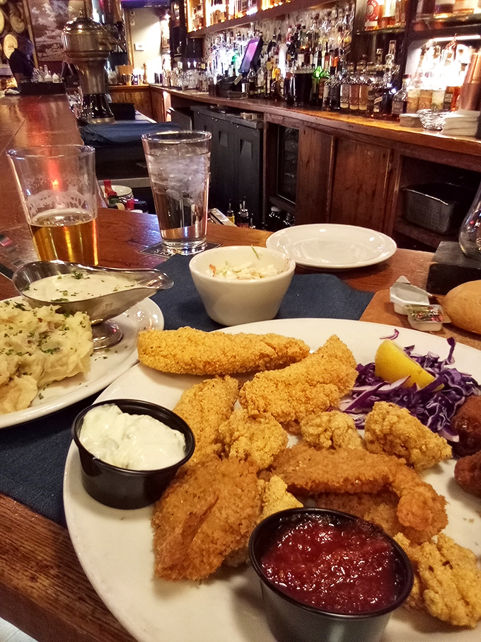Seafood so fresh and golden you'd think Oklahoma suddenly developed a coastline. Those french fries aren't just sides—they're crucial sauce delivery vehicles.