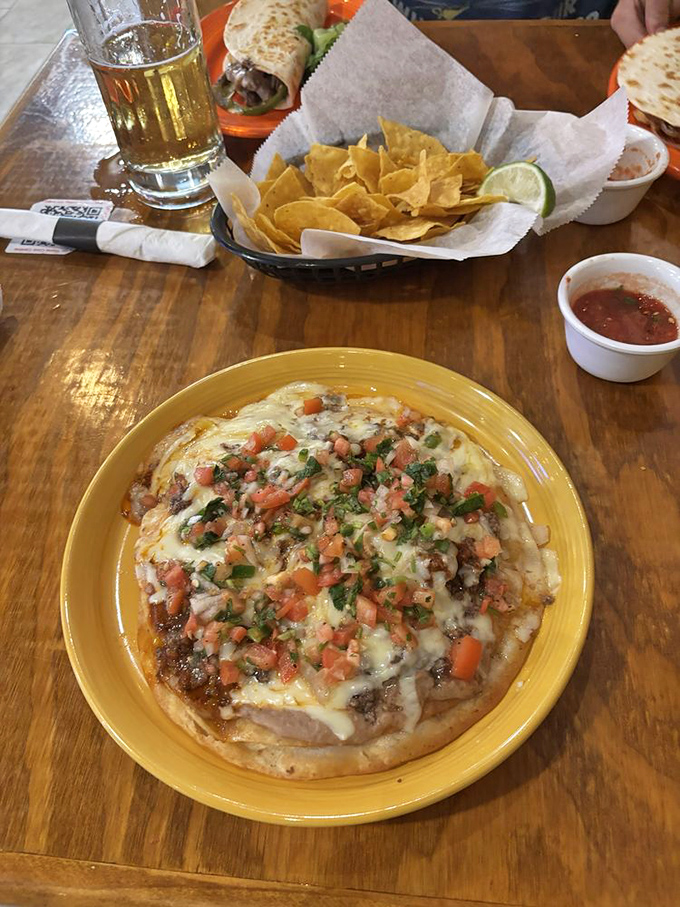 This Mexican pizza makes an Italian grandmother both confused and impressed. Tortillas never had such lofty ambitions until now.