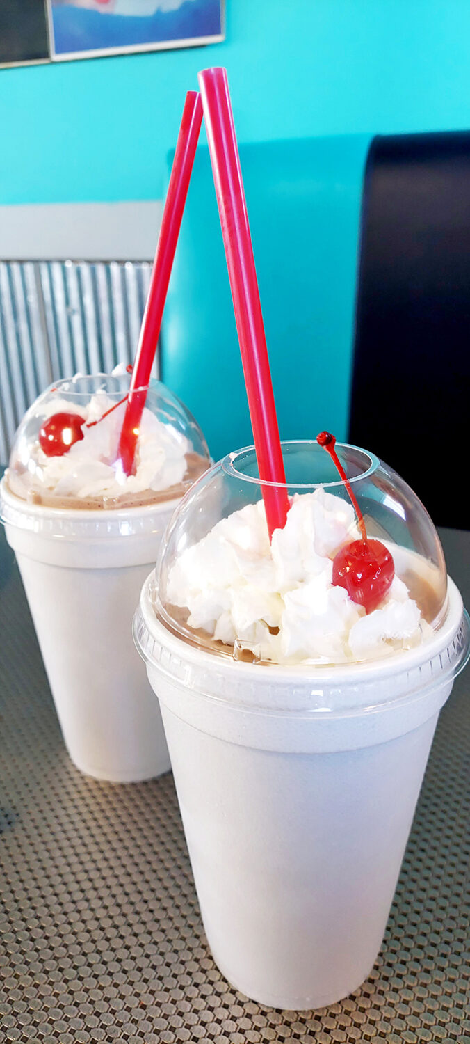 Milkshakes so thick the straws stand at attention. Topped with whipped cream and cherries, they're what modern smoothies wish they could be.