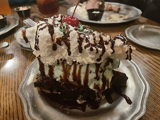 Mint meets chocolate in a towering dessert skyscraper. If the Empire State Building were made of meringue and happiness, it would look like this.